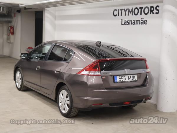 Brown Honda Insight 2014 in Tallinn, with an engine capacity of 1.30 L and mileage of 139 thousand km for 6900 €, photo 3 on AUTOMOTO.COM.LV