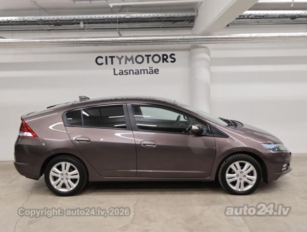 Brown Honda Insight 2014 in Tallinn, with an engine capacity of 1.30 L and mileage of 139 thousand km for 6900 €, photo 5 on AUTOMOTO.COM.LV