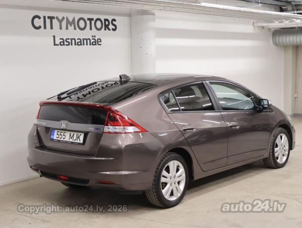 Brown Honda Insight 2014 in Tallinn, with an engine capacity of 1.30 L and mileage of 139 thousand km for 6900 €, photo 6 on AUTOMOTO.COM.LV