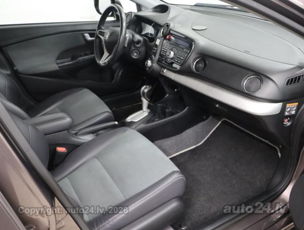 Brown Honda Insight 2014 in Tallinn, with an engine capacity of 1.30 L and mileage of 139 thousand km for 6900 €, photo 8 on AUTOMOTO.COM.LV