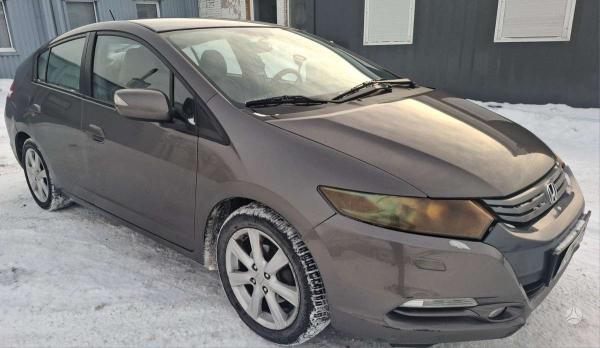 Brūns Honda Insight 2010 Kauņa, ar dzinēja tilpumu 1.34 L un nobraukumu 240 tūkst. km par 2450 €, foto 1 vietnē AUTOMOTO.COM.LV