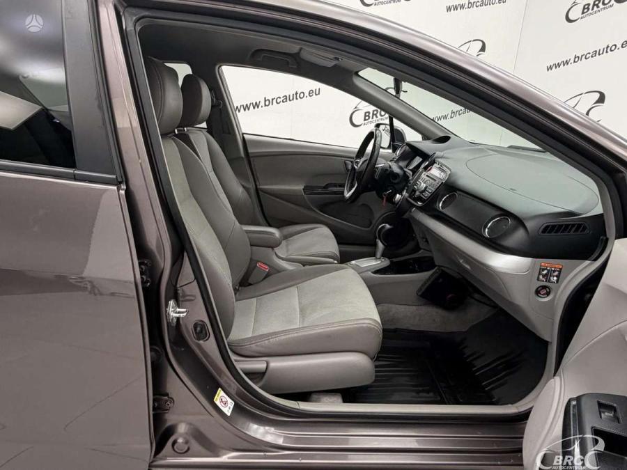 Brown Honda Insight 2012 in Vilnius, with an engine capacity of 1.34 L and mileage of 203 thousand km for 5000 €, photo 6 on AUTOMOTO.COM.LV