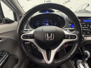 Brown Honda Insight 2012 in Vilnius, with an engine capacity of 1.34 L and mileage of 203 thousand km for 5000 €, photo 28 on AUTOMOTO.COM.LV