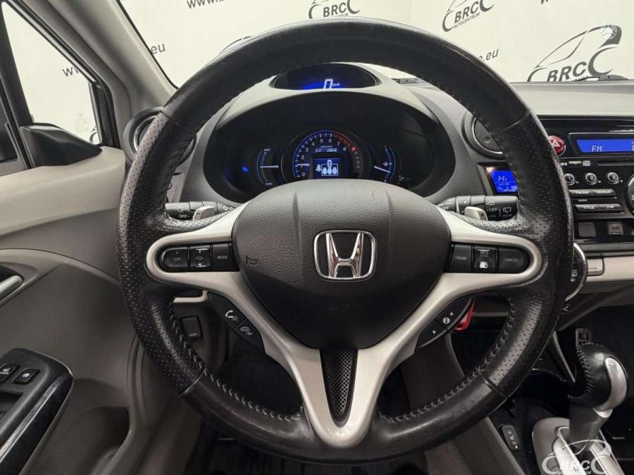 Brown Honda Insight 2012 in Vilnius, with an engine capacity of 1.34 L and mileage of 203 thousand km for 5000 €, photo 28 on AUTOMOTO.COM.LV