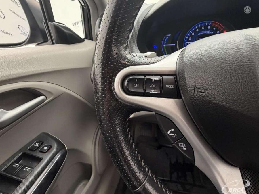 Brown Honda Insight 2012 in Vilnius, with an engine capacity of 1.34 L and mileage of 203 thousand km for 5000 €, photo 30 on AUTOMOTO.COM.LV