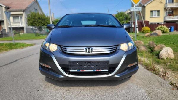 Grey Honda Insight 2009 in Siauliai, with an engine capacity of 1.34 L and mileage of 213 thousand km for 4350 €, photo 2 on AUTOMOTO.COM.LV