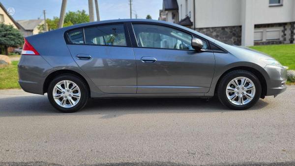 Grey Honda Insight 2009 in Siauliai, with an engine capacity of 1.34 L and mileage of 213 thousand km for 4350 €, photo 6 on AUTOMOTO.COM.LV