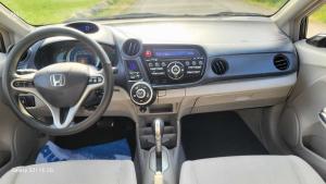 Grey Honda Insight 2009 in Siauliai, with an engine capacity of 1.34 L and mileage of 213 thousand km for 4350 €, photo 15 on AUTOMOTO.COM.LV