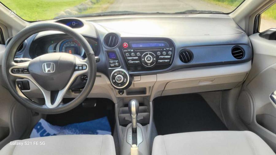 Grey Honda Insight 2009 in Siauliai, with an engine capacity of 1.34 L and mileage of 213 thousand km for 4350 €, photo 15 on AUTOMOTO.COM.LV
