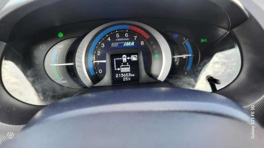 Grey Honda Insight 2009 in Siauliai, with an engine capacity of 1.34 L and mileage of 213 thousand km for 4350 €, photo 21 on AUTOMOTO.COM.LV