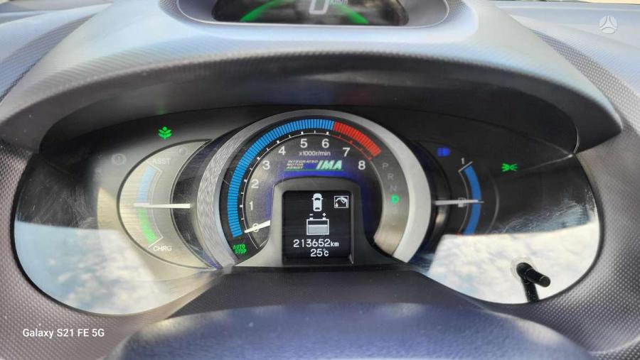Grey Honda Insight 2009 in Siauliai, with an engine capacity of 1.34 L and mileage of 213 thousand km for 4350 €, photo 23 on AUTOMOTO.COM.LV
