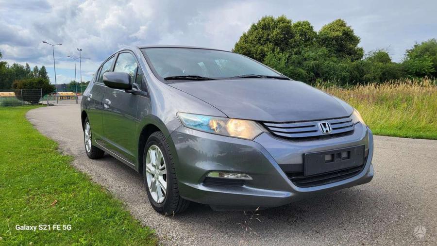 Grey Honda Insight 2009 in Siauliai, with an engine capacity of 1.34 L and mileage of 213 thousand km for 4350 €, photo 29 on AUTOMOTO.COM.LV