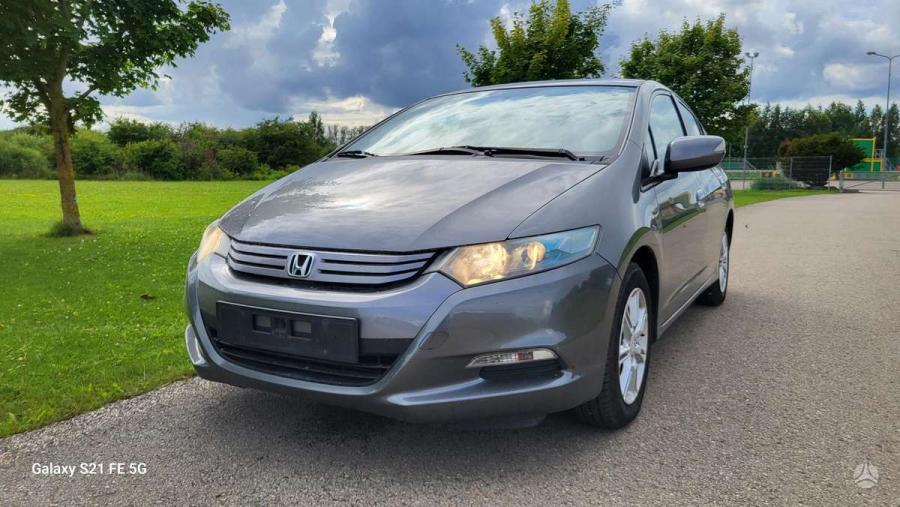 Grey Honda Insight 2009 in Siauliai, with an engine capacity of 1.34 L and mileage of 213 thousand km for 4350 €, photo 30 on AUTOMOTO.COM.LV
