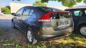 Grey Honda Insight 2009 in Siauliai, with an engine capacity of 1.34 L and mileage of 213 thousand km for 4350 €, photo 40 on AUTOMOTO.COM.LV