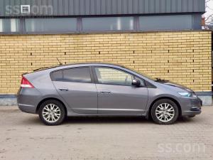 Pelēks Honda Insight 2010 Rīga, ar dzinēja tilpumu 1.40 L un nobraukumu 291 tūkst. km par 4100 €, foto 6 vietnē AUTOMOTO.COM.LV