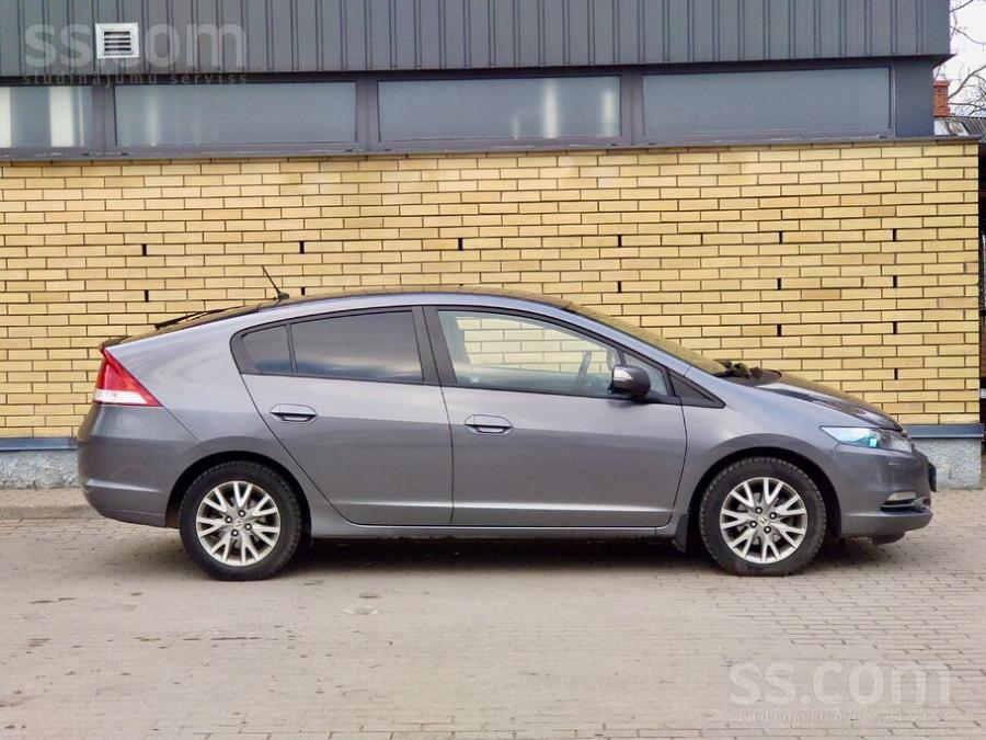 Pelēks Honda Insight 2010 Rīga, ar dzinēja tilpumu 1.40 L un nobraukumu 291 tūkst. km par 4100 €, foto 6 vietnē AUTOMOTO.COM.LV
