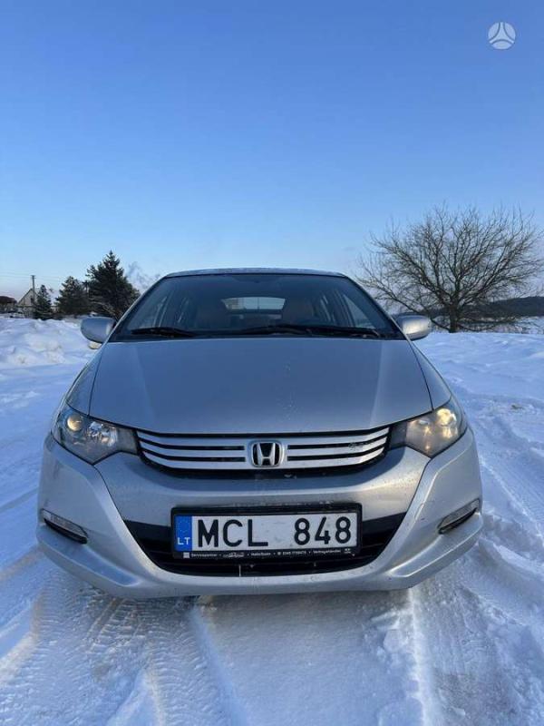 Pelēks Honda Insight 2010 Kauņa, ar dzinēja tilpumu 1.34 L un nobraukumu 202 tūkst. km par 3800 €, foto 8 vietnē AUTOMOTO.COM.LV