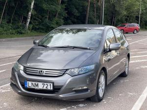 Grey Honda Insight 2010 in Vilnius, with an engine capacity of 1.34 L and mileage of 253 thousand km for 2200 €, photo  on AUTOMOTO.COM.LV