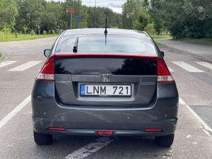 Grey Honda Insight 2010 in Vilnius, with an engine capacity of 1.34 L and mileage of 253 thousand km for 2200 €, photo 5 on AUTOMOTO.COM.LV
