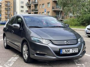 Grey Honda Insight 2010 in Vilnius, with an engine capacity of 1.34 L and mileage of 253 thousand km for 2200 €, photo 8 on AUTOMOTO.COM.LV
