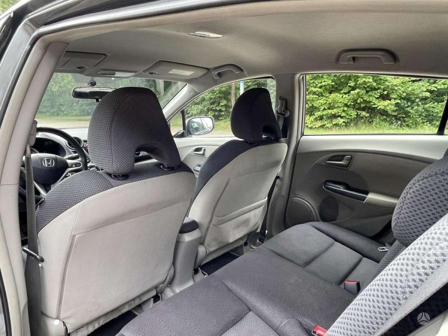 Grey Honda Insight 2010 in Vilnius, with an engine capacity of 1.34 L and mileage of 253 thousand km for 2200 €, photo 12 on AUTOMOTO.COM.LV