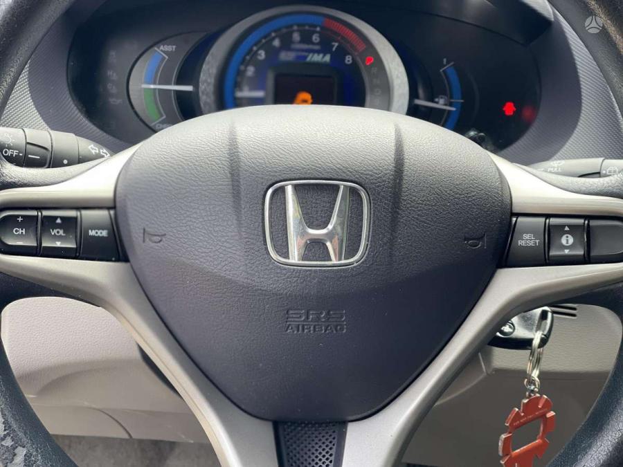 Grey Honda Insight 2010 in Vilnius, with an engine capacity of 1.34 L and mileage of 253 thousand km for 2200 €, photo 18 on AUTOMOTO.COM.LV