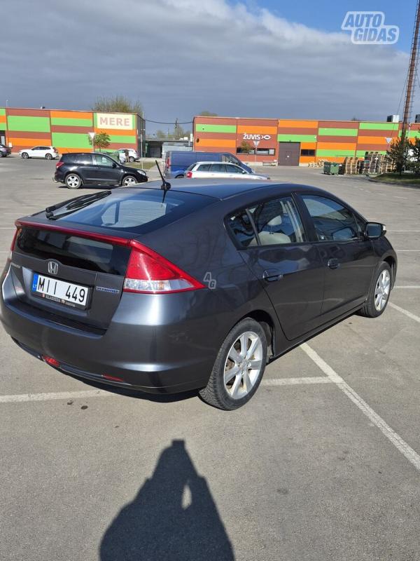 Grey Honda Insight 2011 in Klaipeda, with an engine capacity of 1.30 L and mileage of 220 thousand km for 5200 €, photo 3 on AUTOMOTO.COM.LV