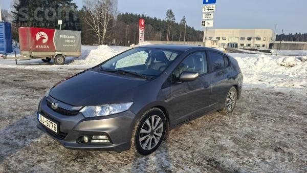 Grey Honda Insight 2012 in Riga, with an engine capacity of 1.30 L and mileage of 216 thousand km for 4250 €, photo 2 on AUTOMOTO.COM.LV
