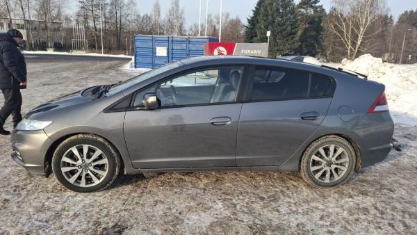 Grey Honda Insight 2012 in Riga, with an engine capacity of 1.30 L and mileage of 216 thousand km for 4250 €, photo 3 on AUTOMOTO.COM.LV