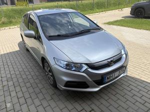 Grey Honda Insight 2013 in Vilnius, with an engine capacity of 1.34 L and mileage of 187 thousand km for 5200 €, photo  on AUTOMOTO.COM.LV