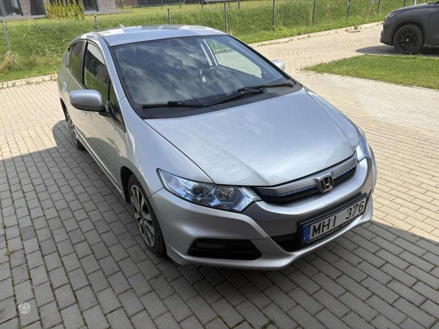 Grey Honda Insight 2013 in Vilnius, with an engine capacity of 1.34 L and mileage of 187 thousand km for 5200 €, photo 1 on AUTOMOTO.COM.LV
