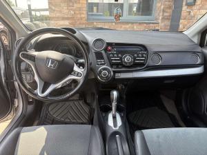 Grey Honda Insight 2013 in Vilnius, with an engine capacity of 1.34 L and mileage of 187 thousand km for 5200 €, photo 6 on AUTOMOTO.COM.LV