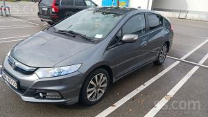 Grey Honda Insight 2015 in Riga, with an engine capacity of 1.30 L and mileage of 144 thousand km for 6100 €, photo  on AUTOMOTO.COM.LV