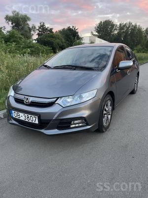 Grey Honda Insight 2013 in Riga, with an engine capacity of 1.20 L and mileage of 255 thousand km for 4900 €, photo  on AUTOMOTO.COM.LV