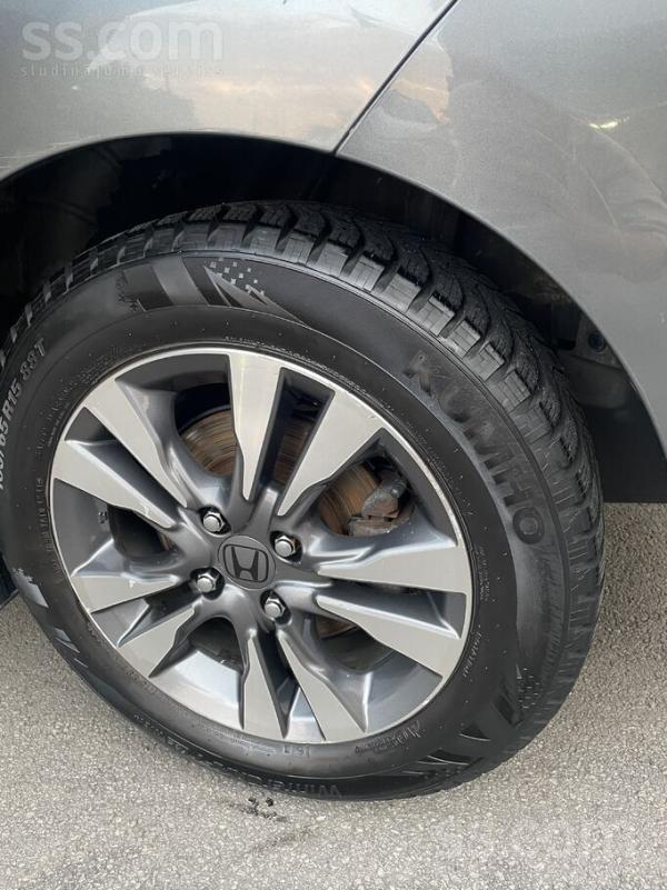 Grey Honda Insight 2013 in Riga, with an engine capacity of 1.20 L and mileage of 255 thousand km for 4900 €, photo 6 on AUTOMOTO.COM.LV