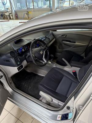 Honda Insight 2009 Viļņa, ar dzinēja tilpumu 1.30 L un nobraukumu 195 tūkst. km par 3000 €, foto 11 vietnē AUTOMOTO.COM.LV