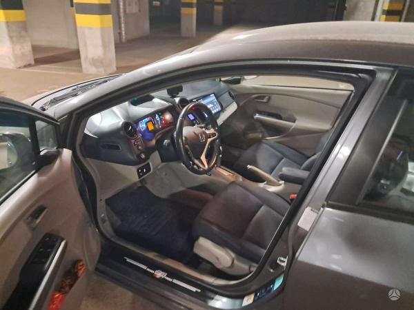 Honda Insight 2010 Viļņa, ar dzinēja tilpumu 1.34 L un nobraukumu 158 tūkst. km par 4980 €, foto 5 vietnē AUTOMOTO.COM.LV