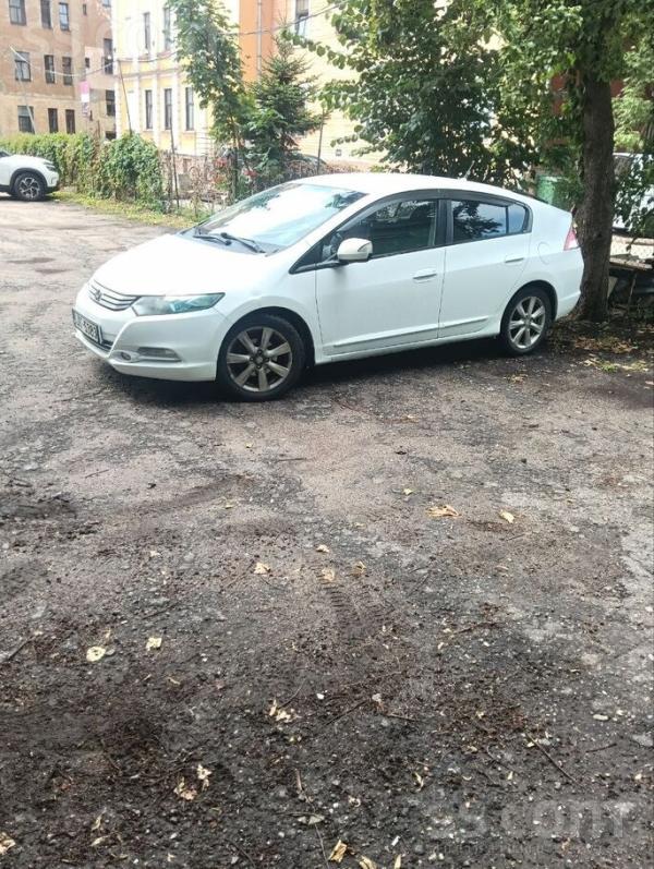Balts Honda Insight 2009 Rīga, ar dzinēja tilpumu 1.30 L un nobraukumu 348 tūkst. km par 2000 €, foto 1 vietnē AUTOMOTO.COM.LV