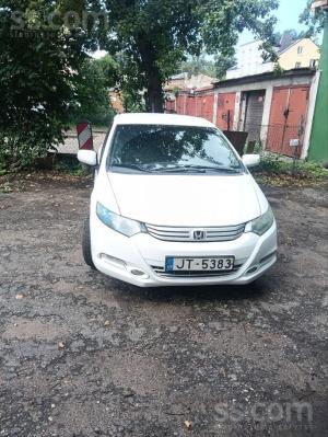 White Honda Insight 2009 in Riga, with an engine capacity of 1.30 L and mileage of 348 thousand km for 2000 €, photo 3 on AUTOMOTO.COM.LV