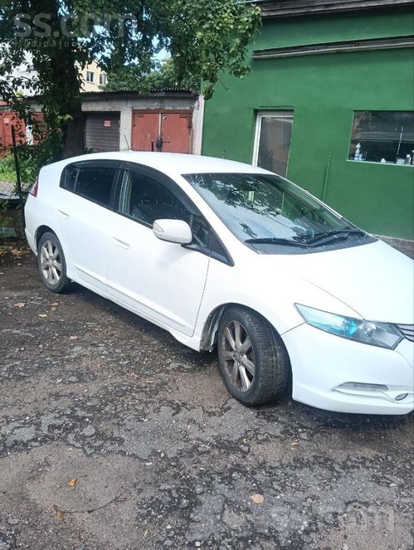 Balts Honda Insight 2009 Rīga, ar dzinēja tilpumu 1.30 L un nobraukumu 348 tūkst. km par 2000 €, foto 3 vietnē AUTOMOTO.COM.LV