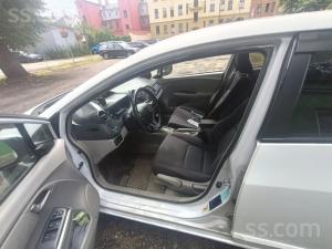 White Honda Insight 2009 in Riga, with an engine capacity of 1.30 L and mileage of 348 thousand km for 2000 €, photo 10 on AUTOMOTO.COM.LV