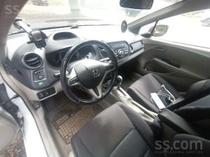 White Honda Insight 2009 in Riga, with an engine capacity of 1.30 L and mileage of 348 thousand km for 2000 €, photo 11 on AUTOMOTO.COM.LV