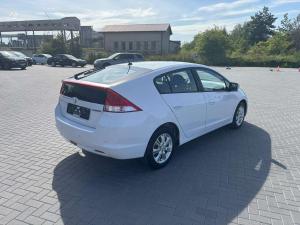 White Honda Insight 2009 in Telschi, with an engine capacity of 1.34 L and mileage of 198 thousand km for 3999 €, photo 4 on AUTOMOTO.COM.LV