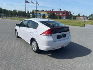 White Honda Insight 2009 in Telschi, with an engine capacity of 1.34 L and mileage of 198 thousand km for 3999 €, photo 7 on AUTOMOTO.COM.LV