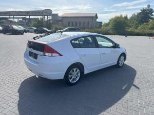 White Honda Insight 2009 in Telschi, with an engine capacity of 1.34 L and mileage of 198 thousand km for 3999 €, photo 8 on AUTOMOTO.COM.LV