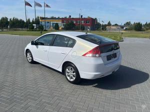 White Honda Insight 2009 in Telschi, with an engine capacity of 1.34 L and mileage of 198 thousand km for 3999 €, photo 11 on AUTOMOTO.COM.LV
