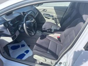 White Honda Insight 2009 in Telschi, with an engine capacity of 1.34 L and mileage of 198 thousand km for 3999 €, photo 12 on AUTOMOTO.COM.LV