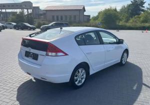 White Honda Insight 2009 in Telschi, with an engine capacity of 1.30 L and mileage of 197 thousand km for 3990 €, photo 5 on AUTOMOTO.COM.LV