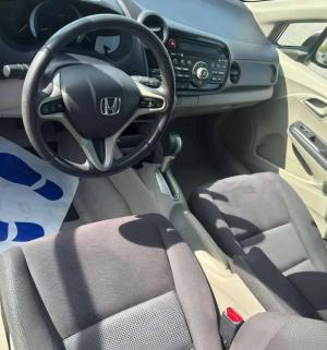 White Honda Insight 2009 in Telschi, with an engine capacity of 1.30 L and mileage of 197 thousand km for 3990 €, photo 9 on AUTOMOTO.COM.LV