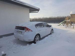 Balts Honda Insight 2010 Kretinga, ar dzinēja tilpumu 1.34 L un nobraukumu 237 tūkst. km par 2000 €, foto  vietnē AUTOMOTO.COM.LV